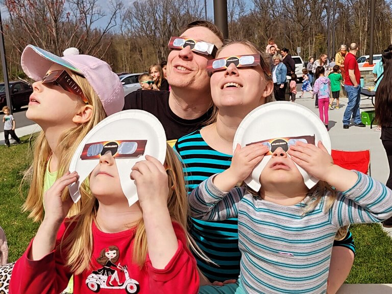 ‘Eclipse mania’: Community members flock together for partial solar ...
